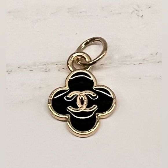 CHANEL | Accessories | Chanel Black And Gold Clover Zipper Pull | Poshmark